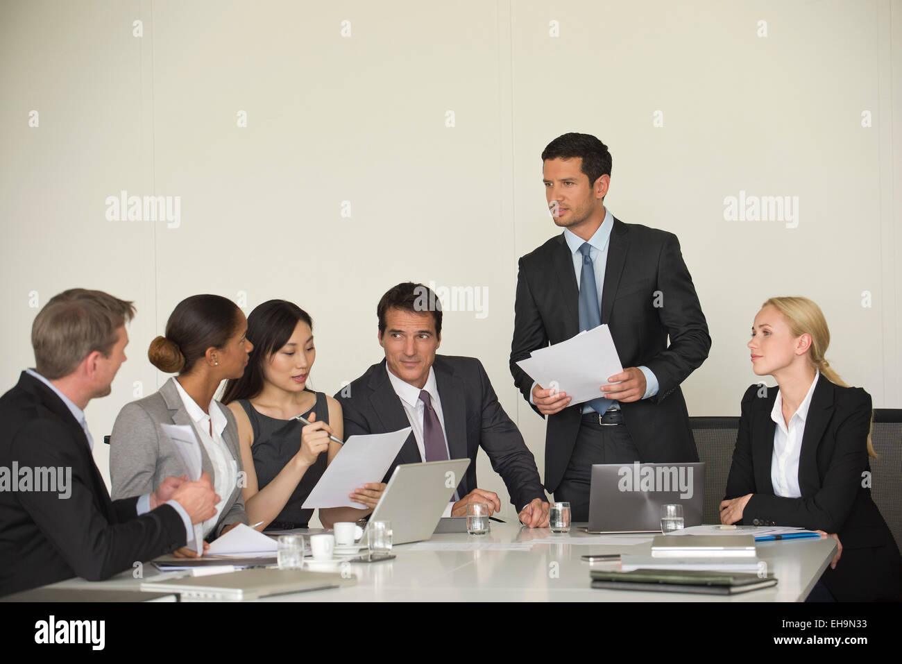 Executive giving presentation in meeting Stock Photo - Alamy