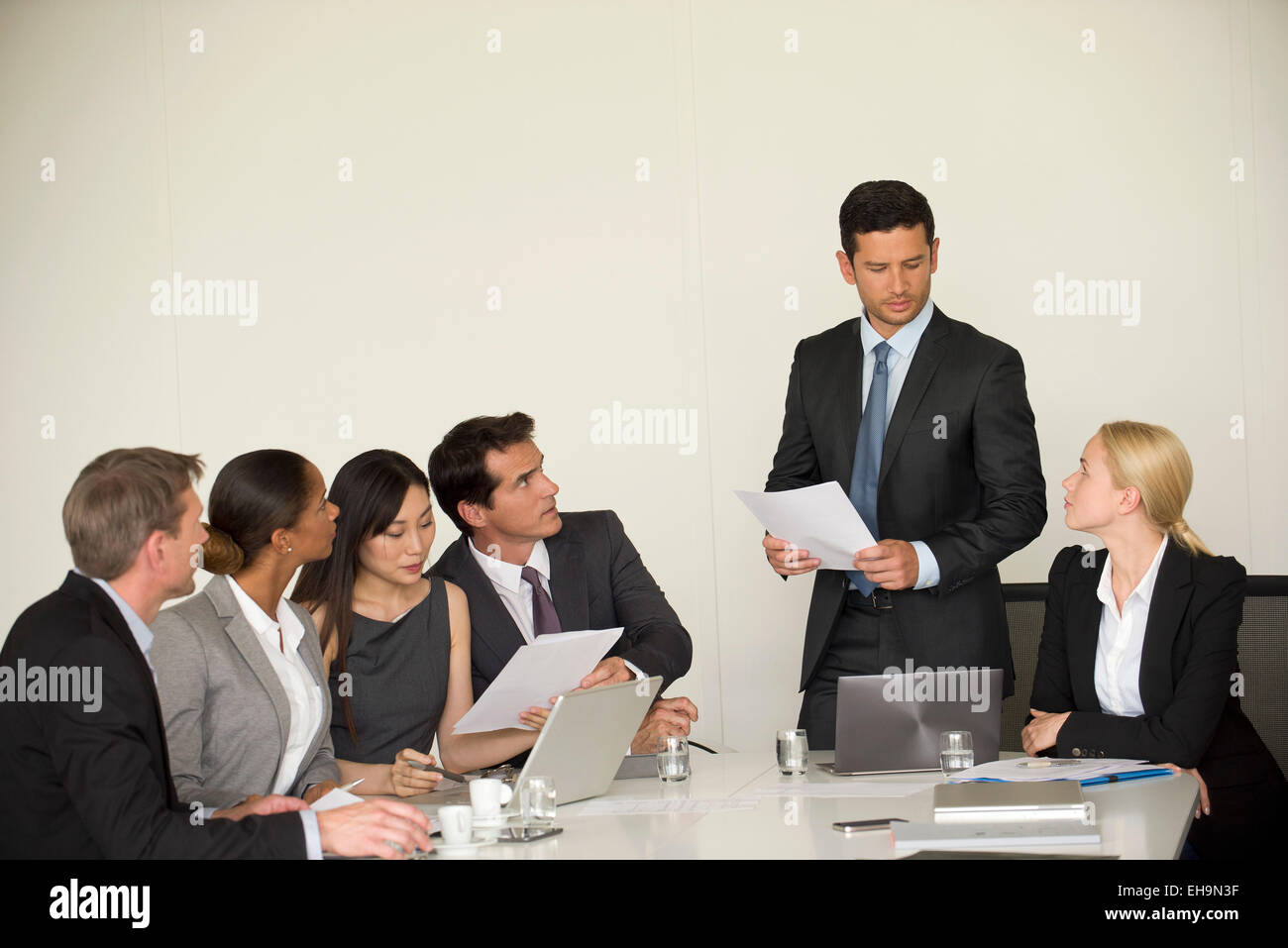 Executive giving presentation in meeting Stock Photo - Alamy