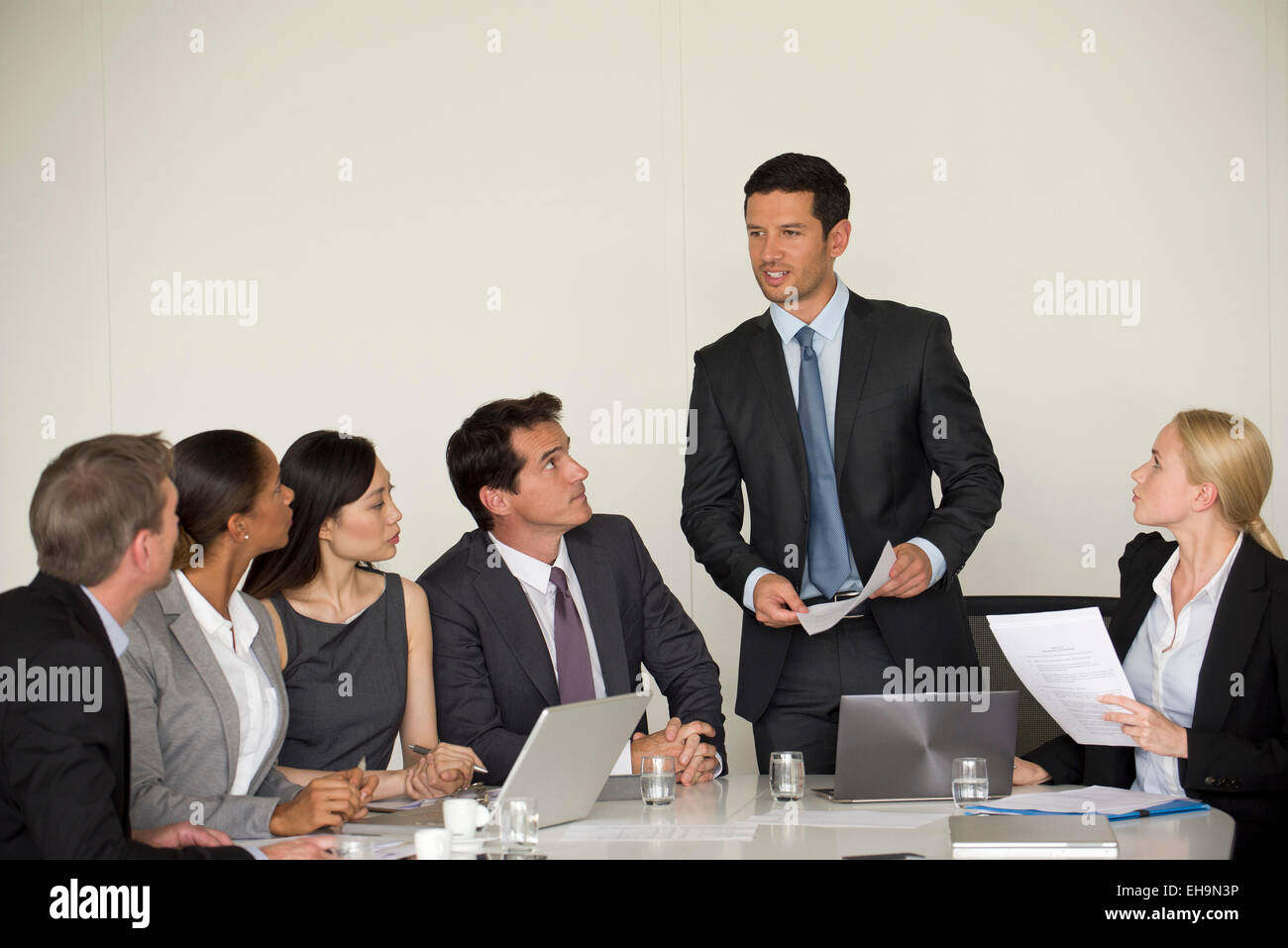 Executive giving presentation in meeting Stock Photo - Alamy