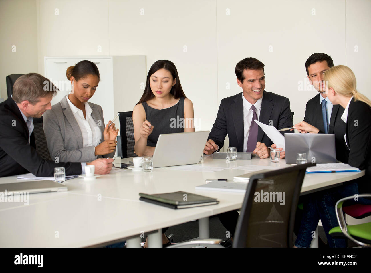 Executives in meeting Stock Photo - Alamy