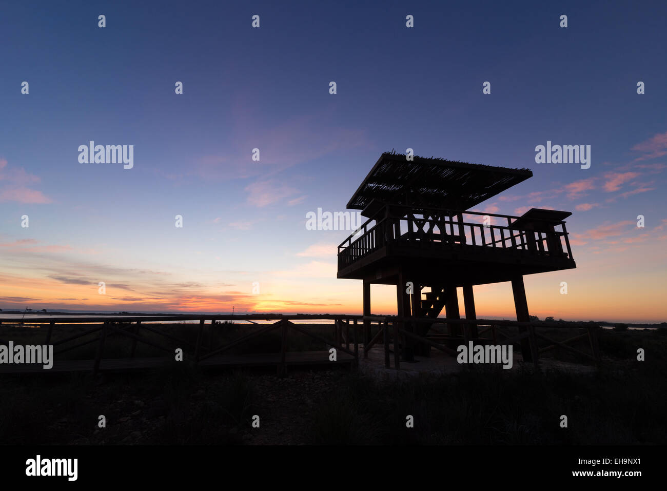 Wooden wildlife observation watchtower against the background of a ...