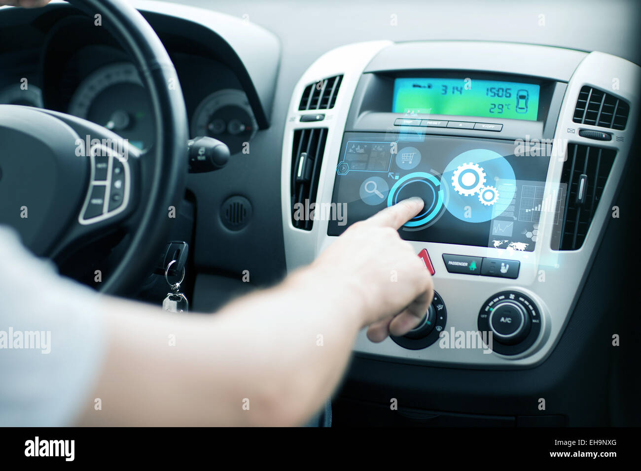 man using car control panel Stock Photo - Alamy