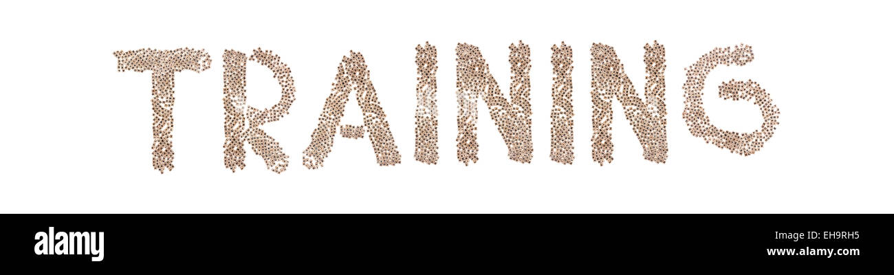Training written in letters formed with wooden cubes with letters ...