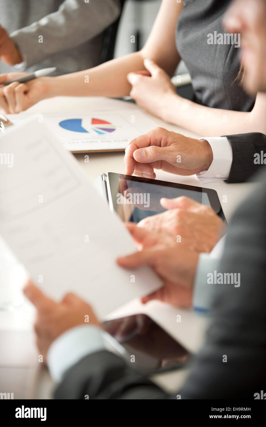 Executives in meeting, cropped Stock Photo - Alamy