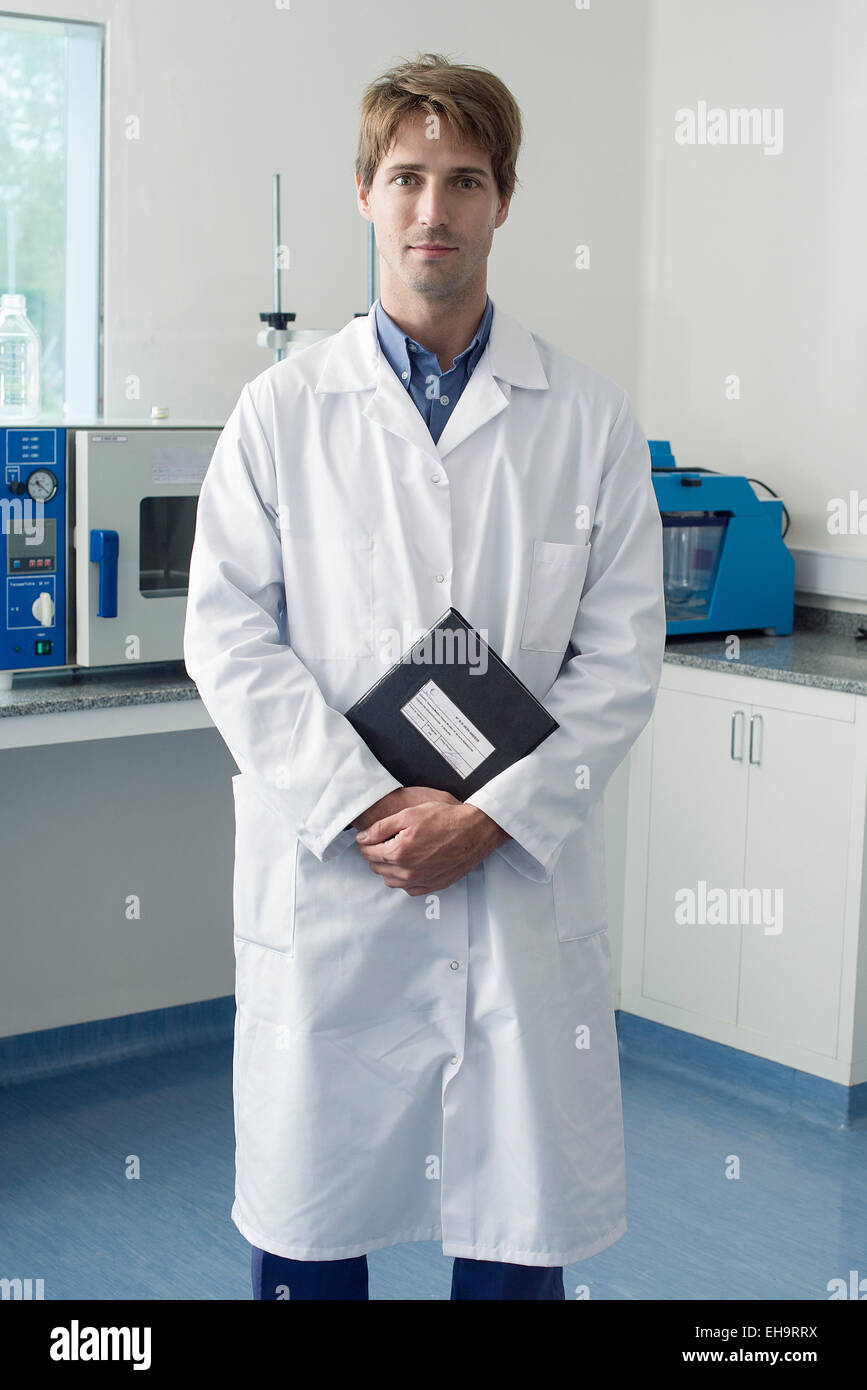 Scientist standing in laboratory, portrait Stock Photo - Alamy