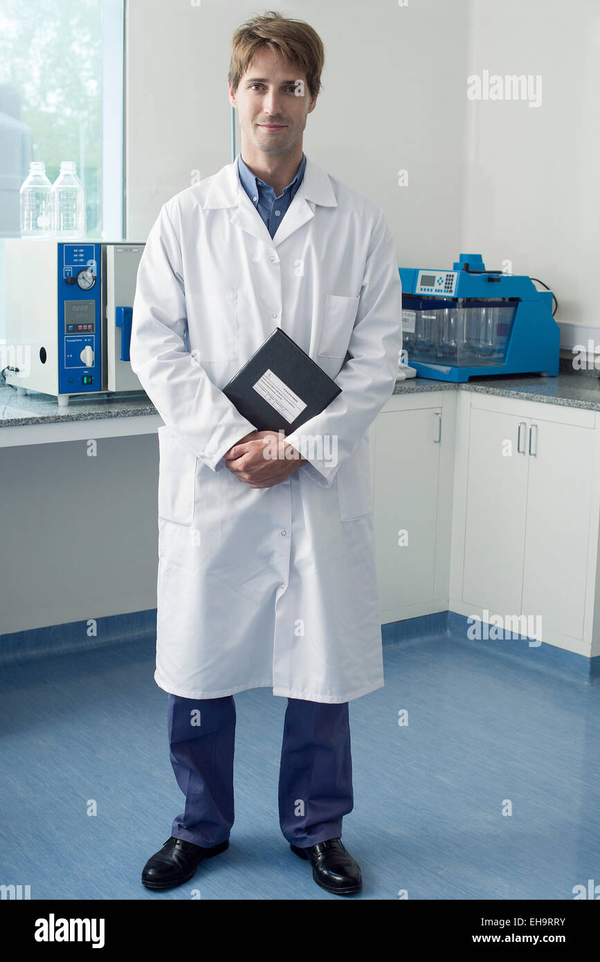 Scientist standing in laboratory, portrait Stock Photo - Alamy