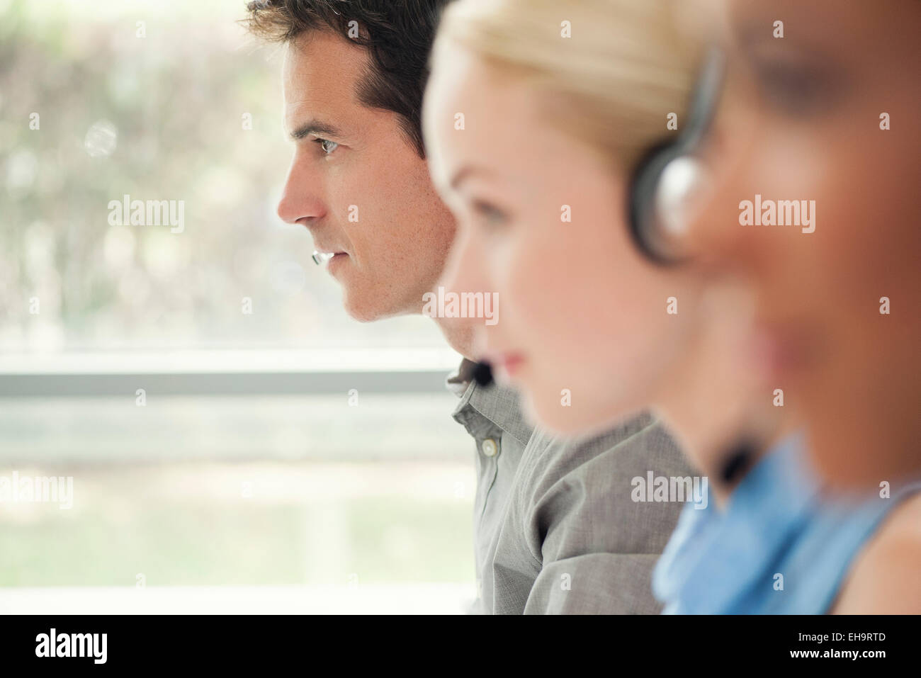 Working in call center Stock Photo - Alamy