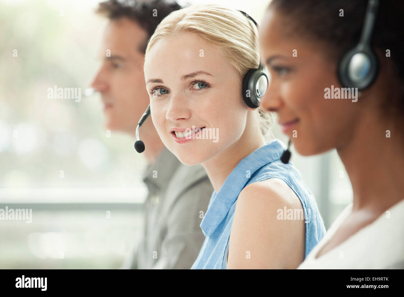Working in call center Stock Photo - Alamy