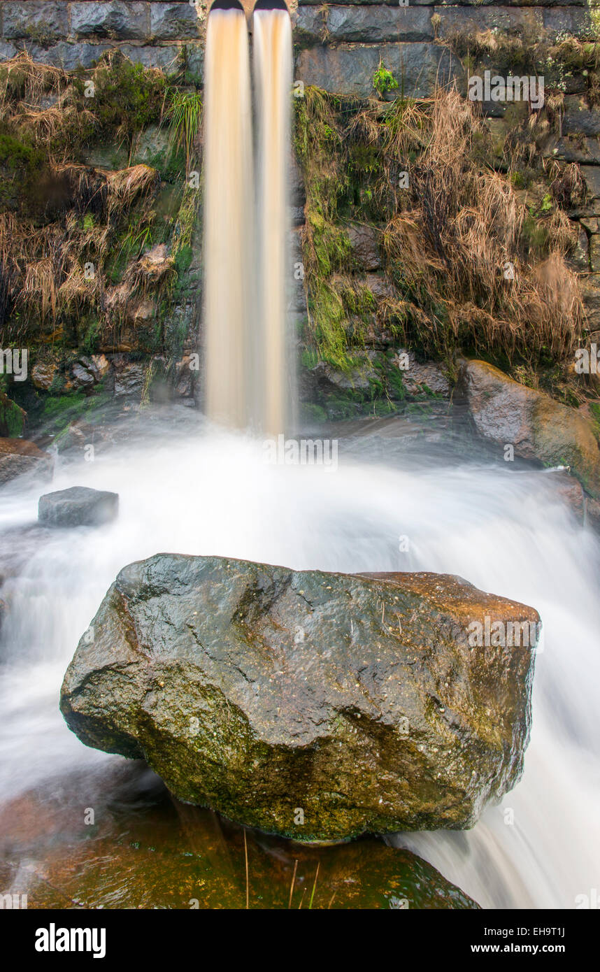 Water overflow pipes allowing water from a dam to overflow into the ...