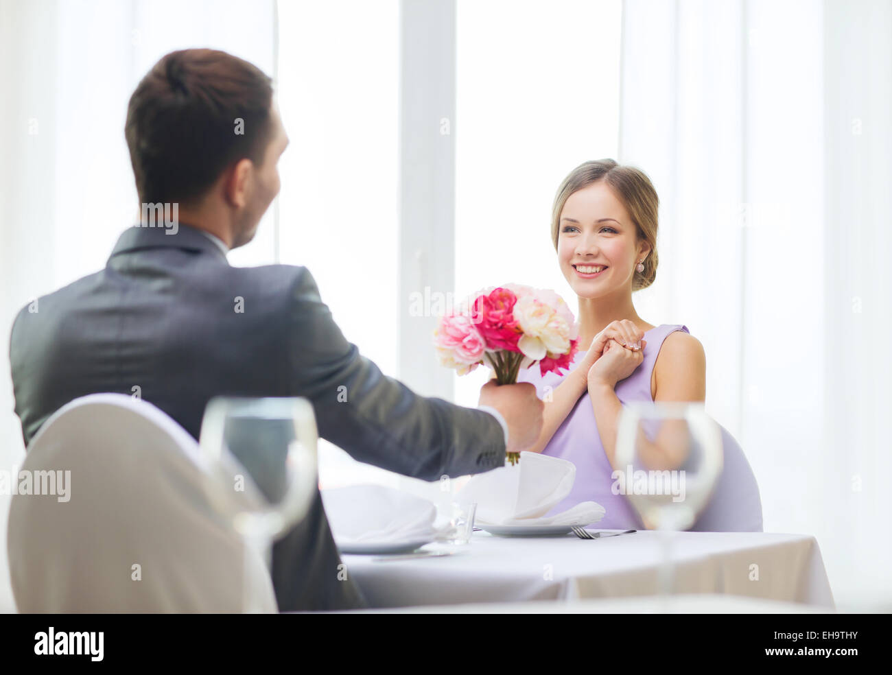Woman receive flowers hi-res stock photography and images - Alamy