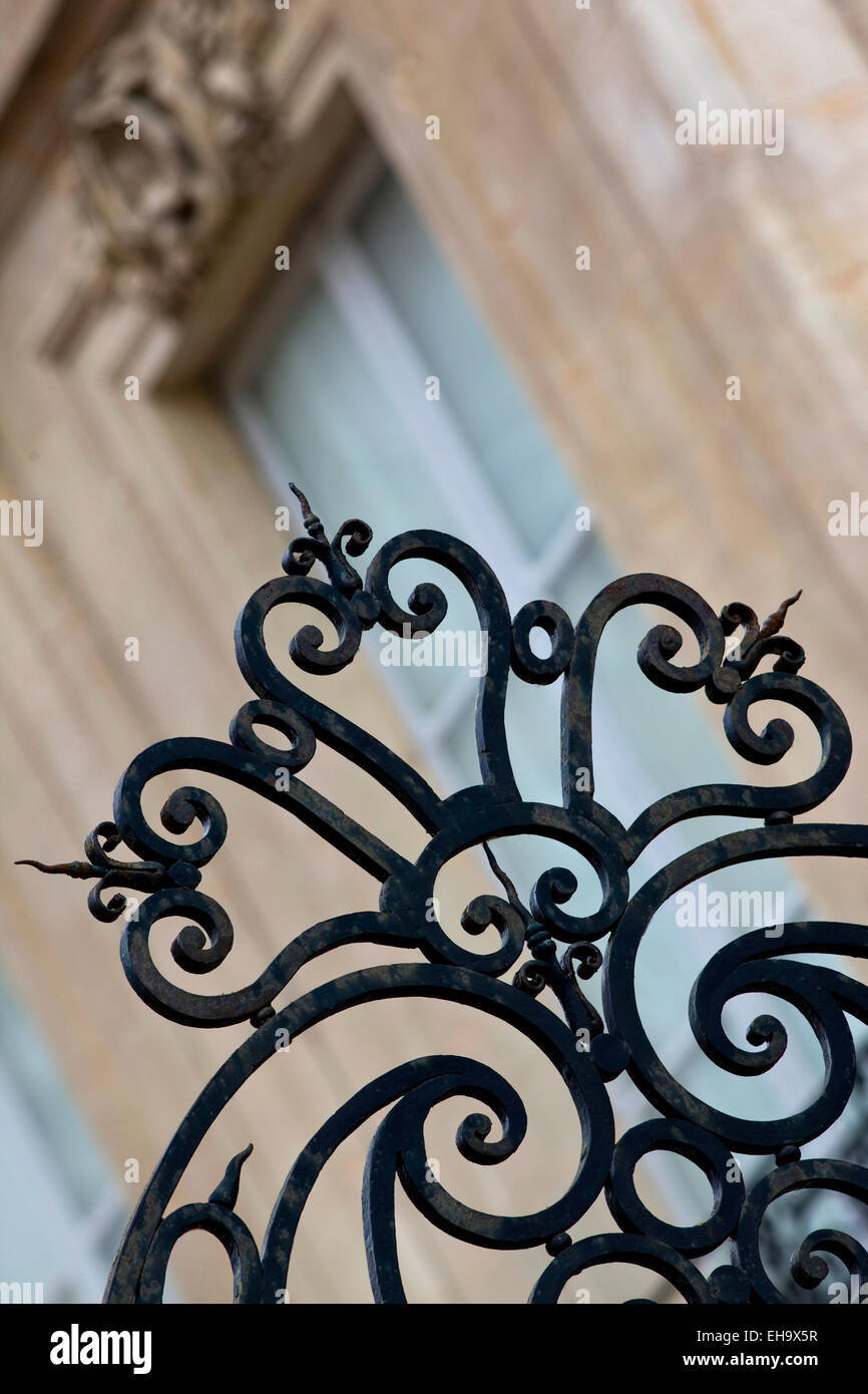 Rusty wrought iron gate in front of a French mansion Stock Photo - Alamy