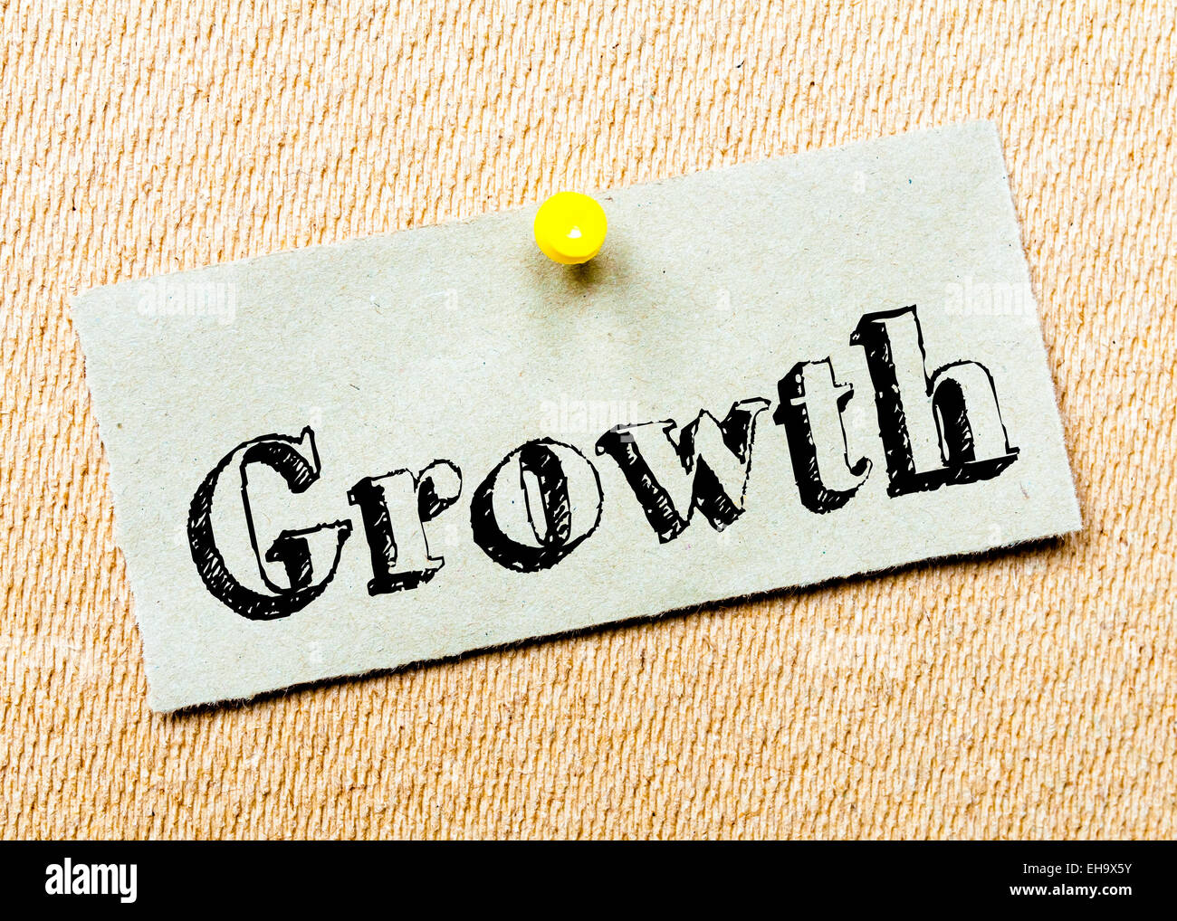 Recycled paper note pinned on cork board. Growth Message. Concept Image ...