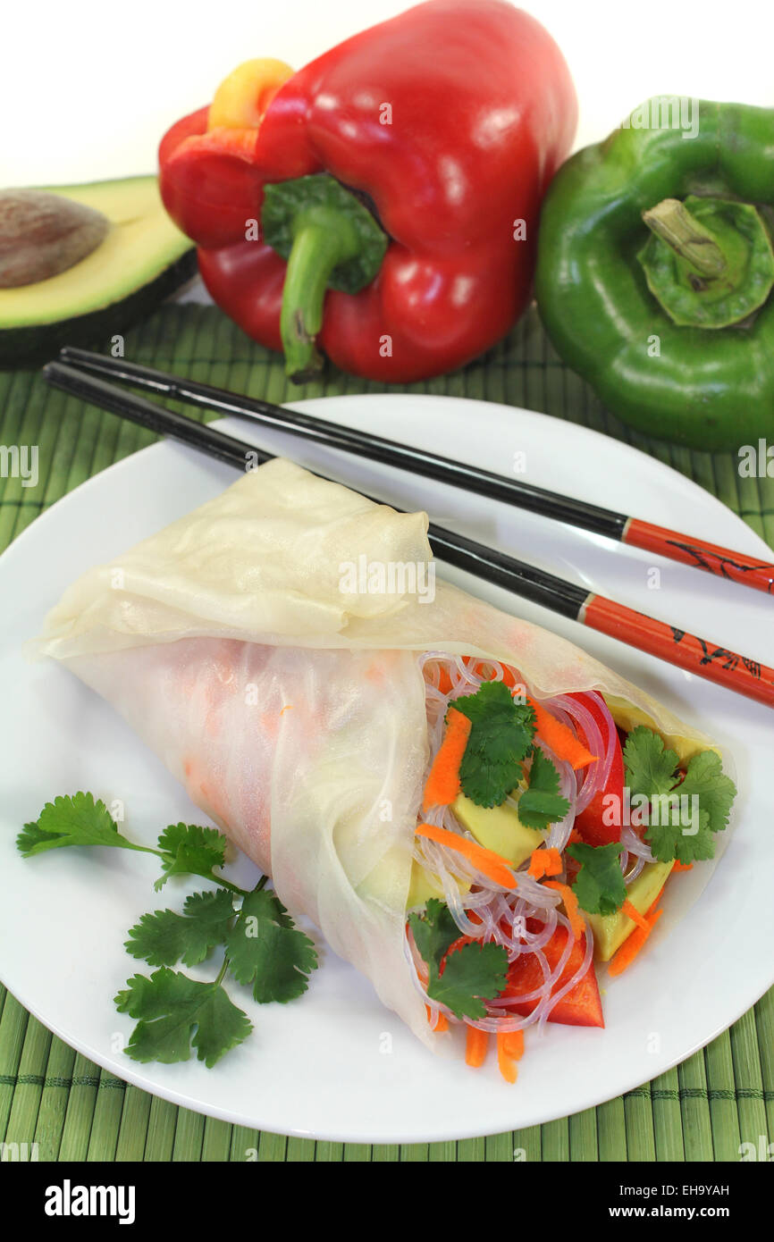 Rice paper stuffed with glass noodles, carrots, peppers and cilantro ...
