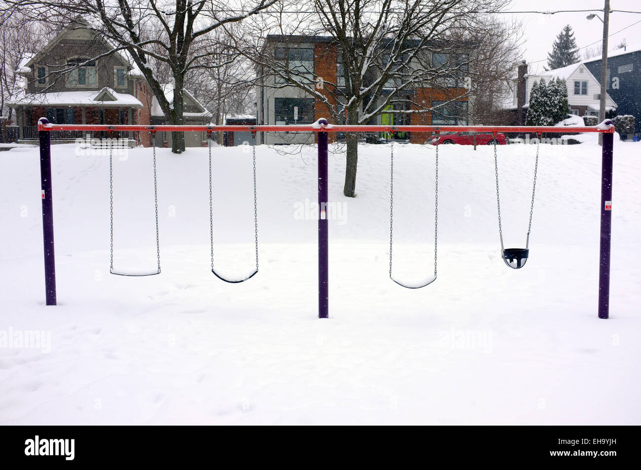 Swings playground hi-res stock photography and images - Alamy
