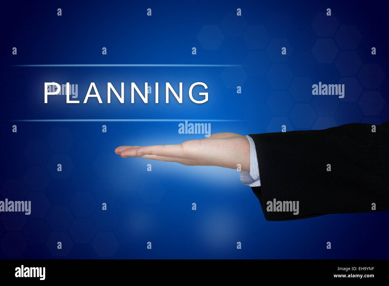planning button with business hand on blue background Stock Photo - Alamy