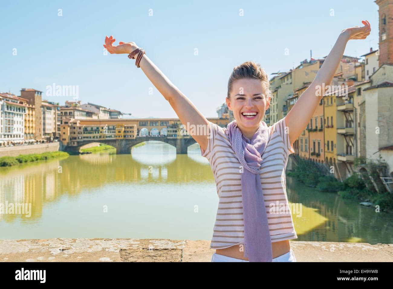 Woman standing bridge overlooking river hi-res stock photography and ...