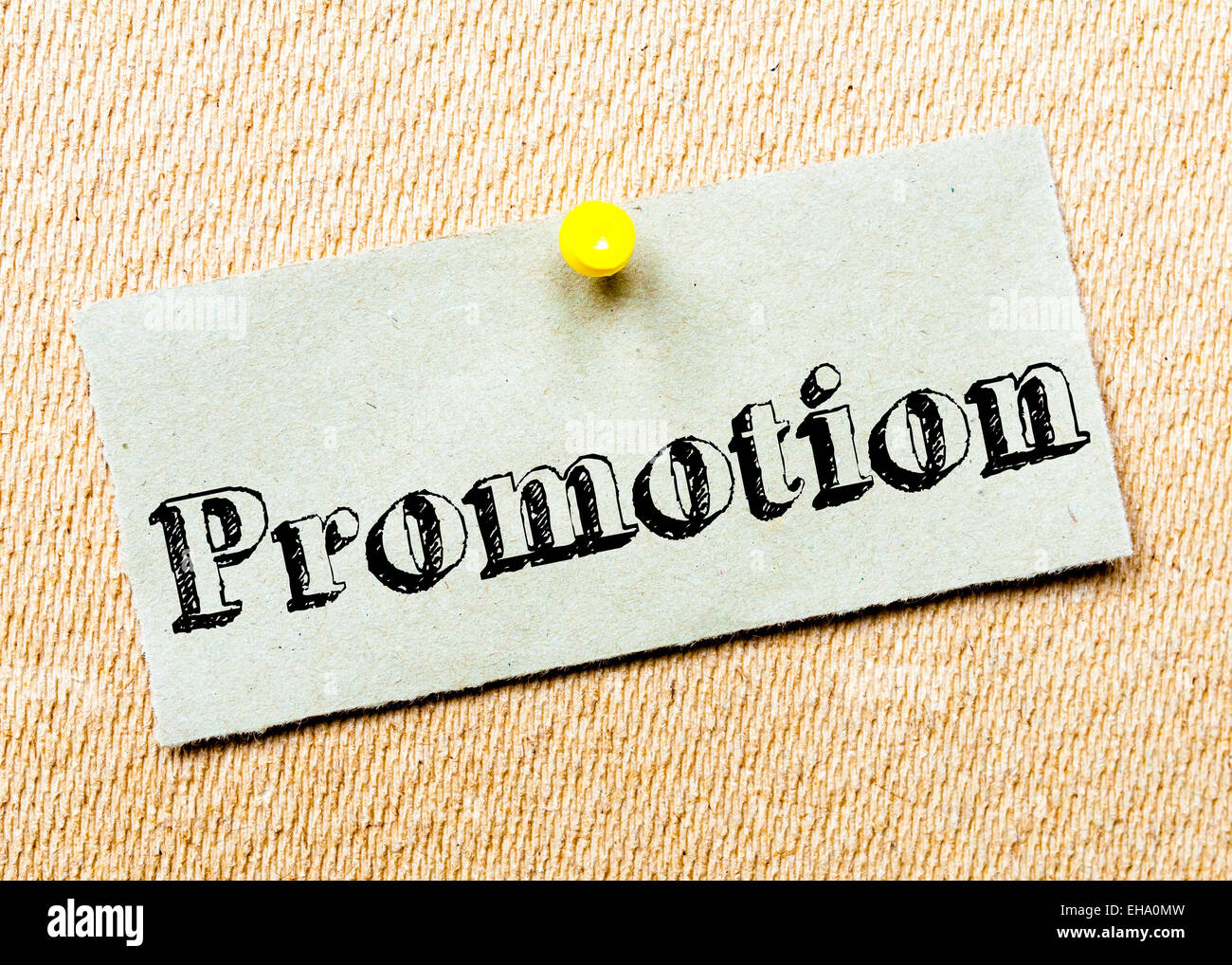 Recycled paper note pinned on cork board. Promotion Message. Concept ...