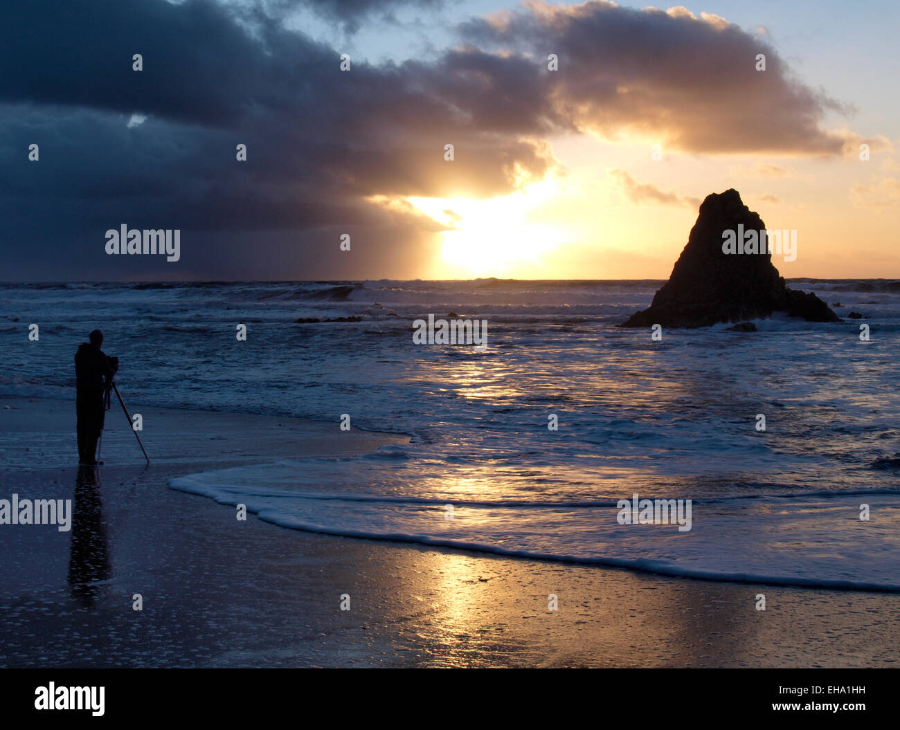 Silhouette of a Photographer at sunset, Black Rock, Widemouth Bay, Bude ...