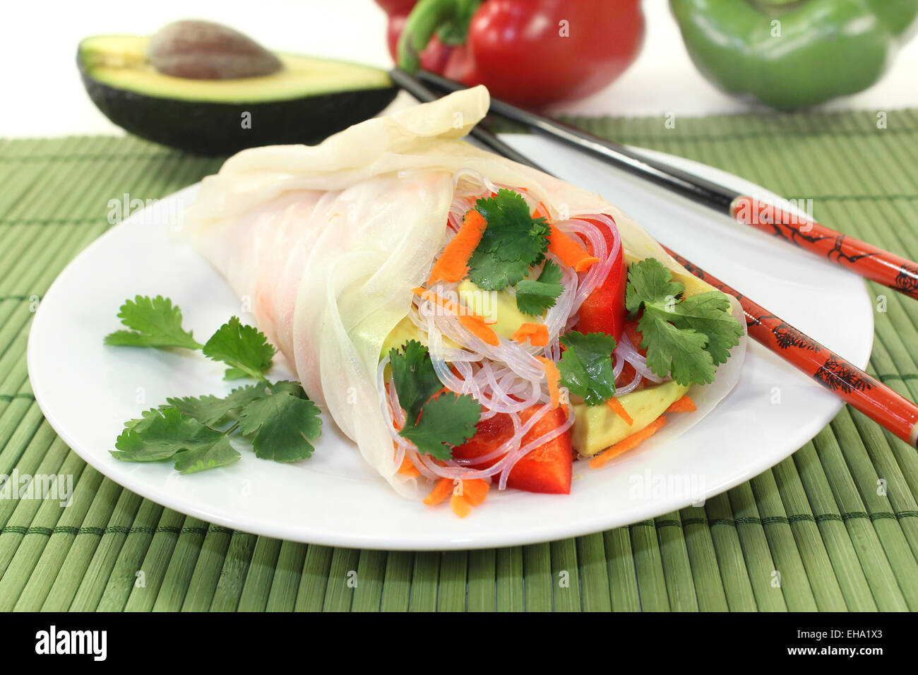 Rice paper stuffed with glass noodles, carrots, peppers and cilantro ...