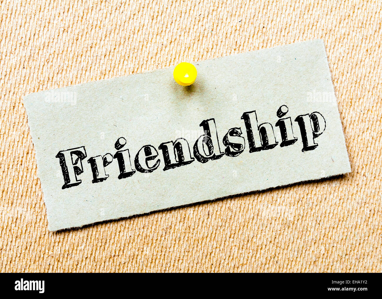 Recycled paper note pinned on cork board. Friendship Message. Concept ...