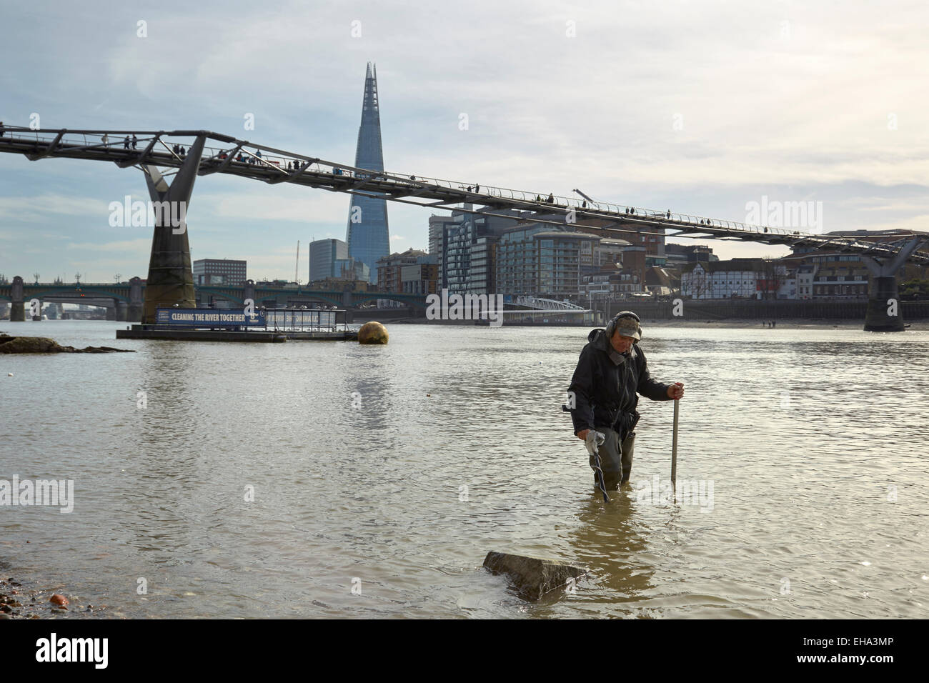 London, UK. 10th March, 2015. A spring low tide on the River Thames and ...