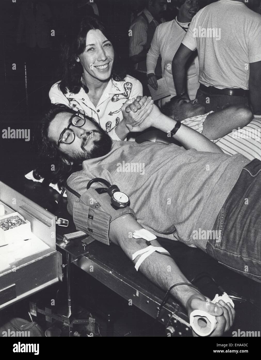 LILY TOMLIN with John Landis. © S. Schatzberg/Globe Photos/ZUMA Wire ...