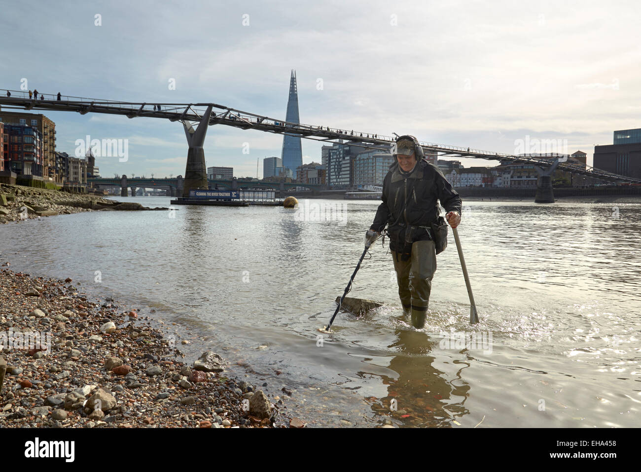 London, UK. 10th March, 2015. A spring low tide on the River Thames and ...