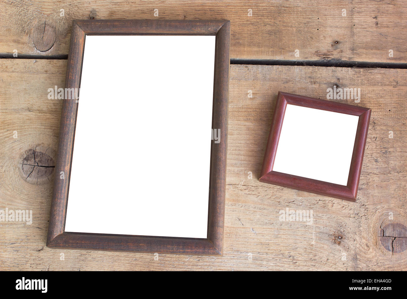 Old photo frames on wooden background Stock Photo - Alamy