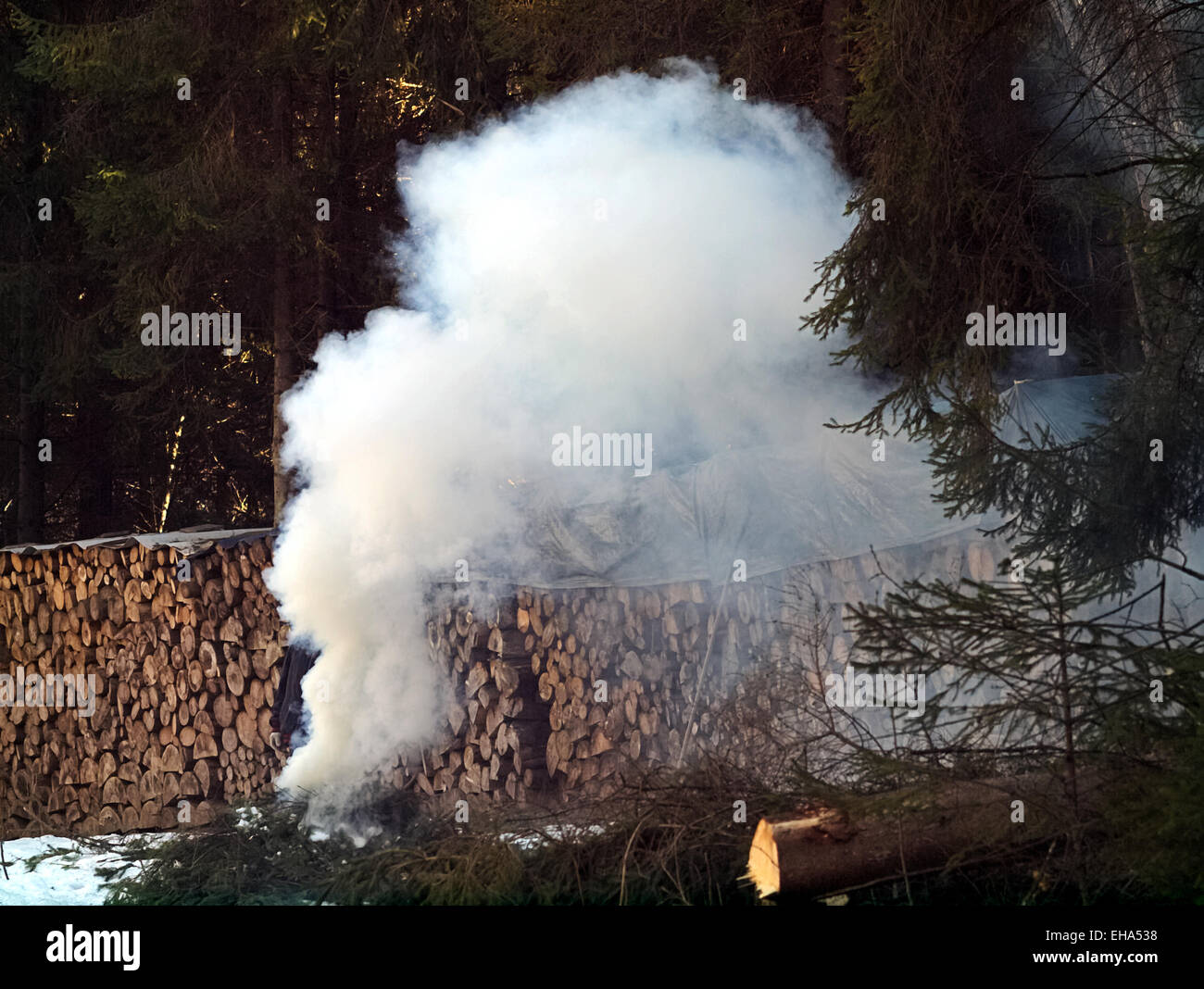 Wisp of smoke rising up and give a signal that the people working here ...