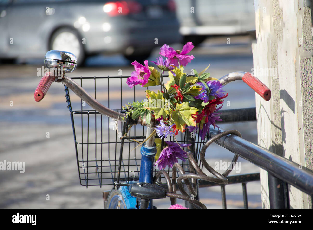 Spring flowers decorate standing bicycle Stock Photo - Alamy