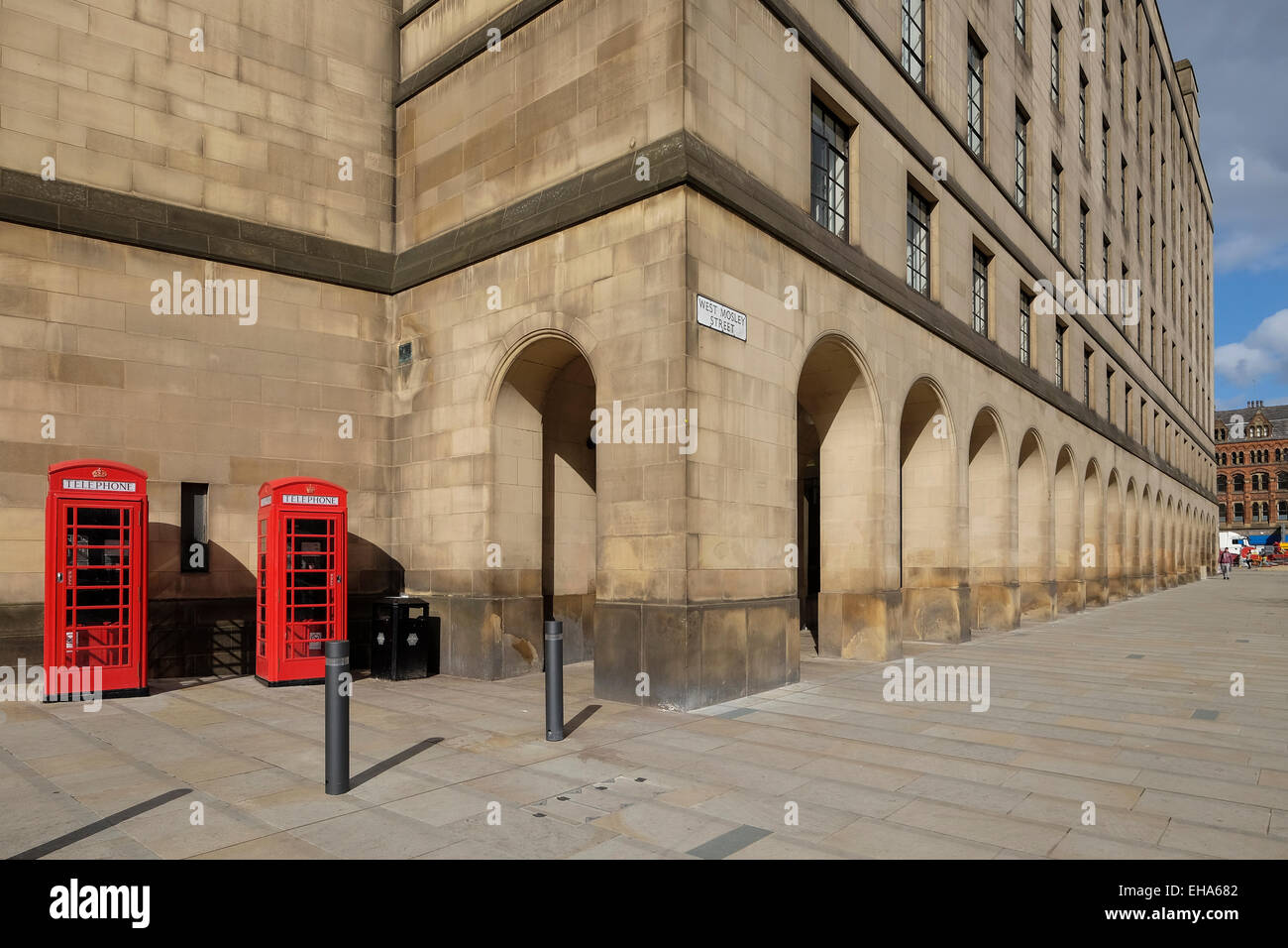 Manchester England: Two Red Telephone Boxes stand outside Manchester ...