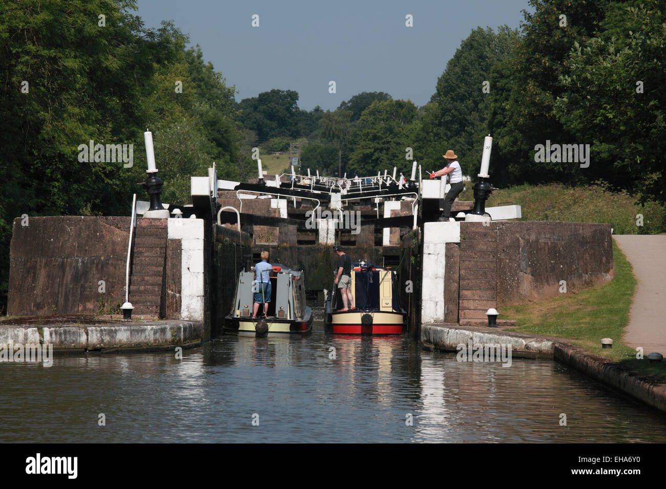 Two narrowboats entering double lock 37 of the Hatton flight on the ...
