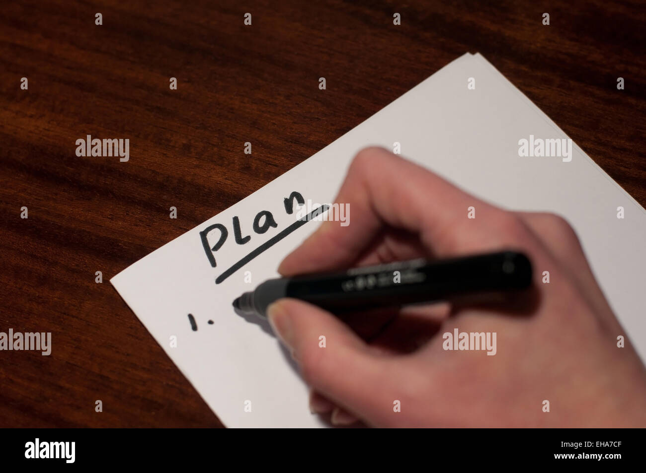 Somebody writing plan by hand Stock Photo - Alamy