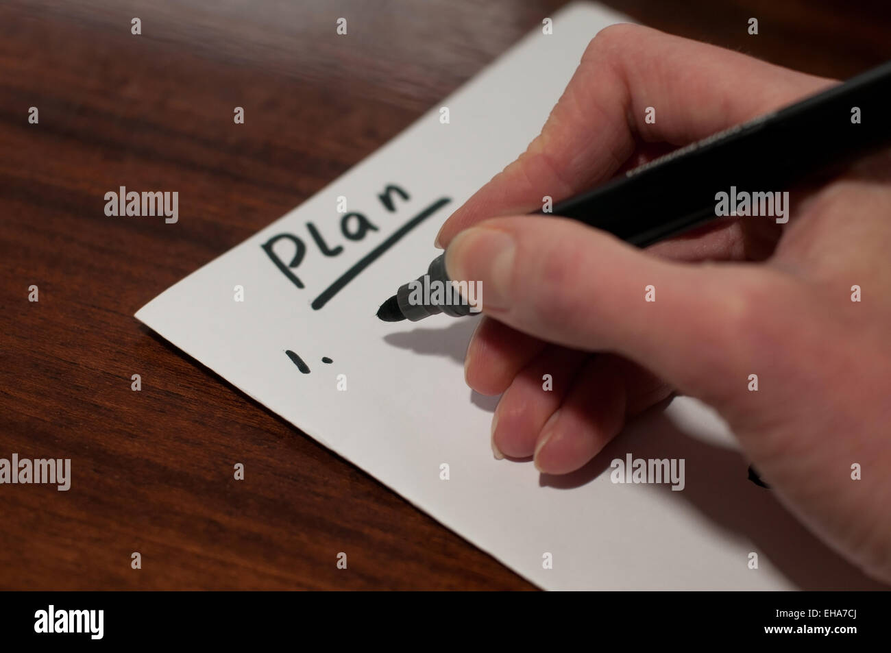 Somebody writing plan by hand on white sheet Stock Photo - Alamy