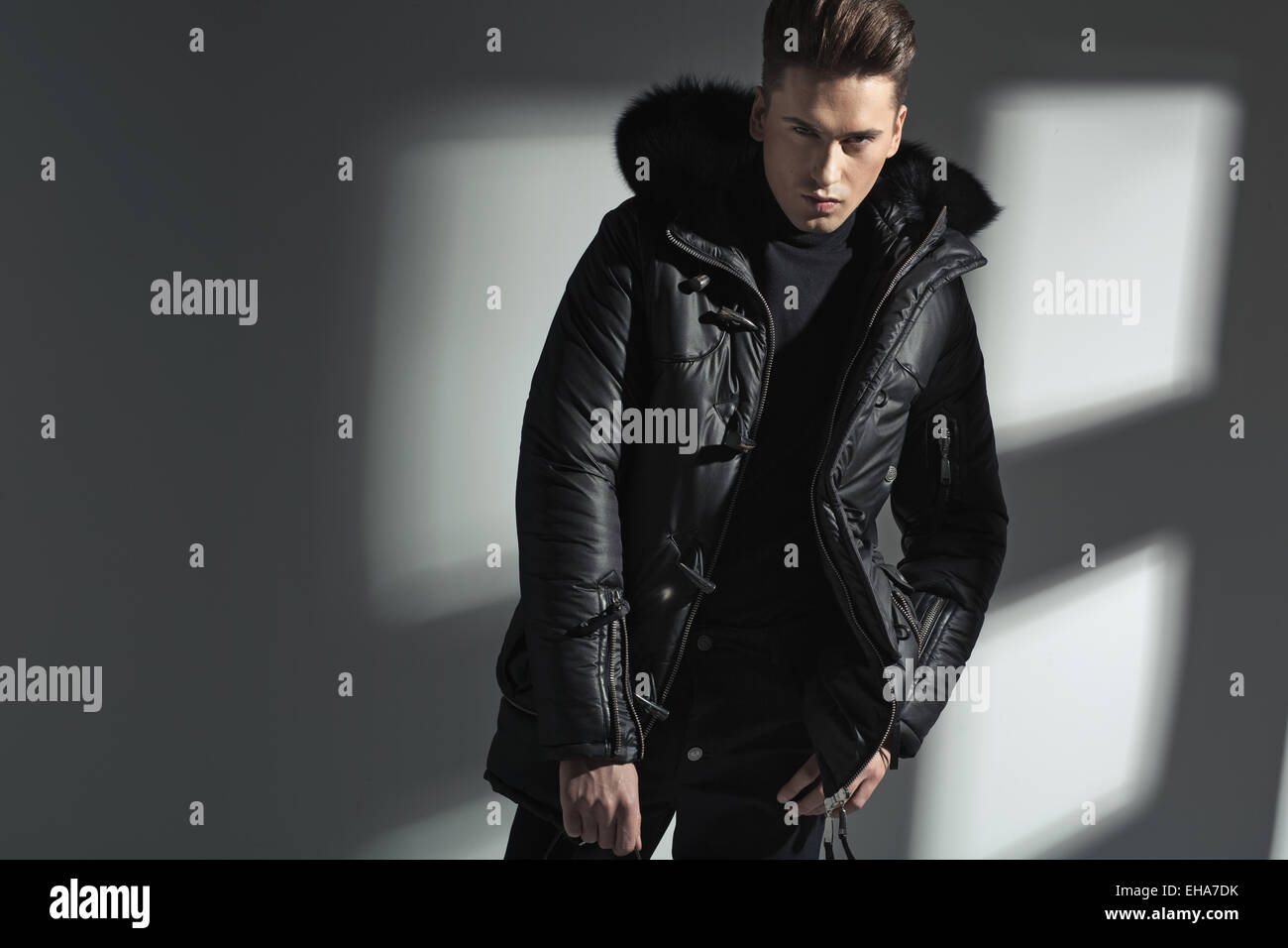 Male posing wearing winter jacket hi-res stock photography and images ...