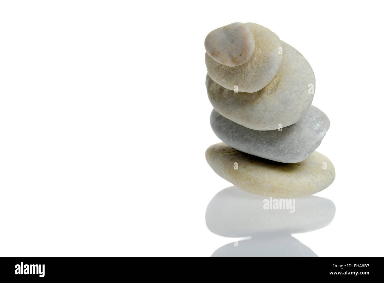 Stones stacked isolated with reflection Stock Photo - Alamy