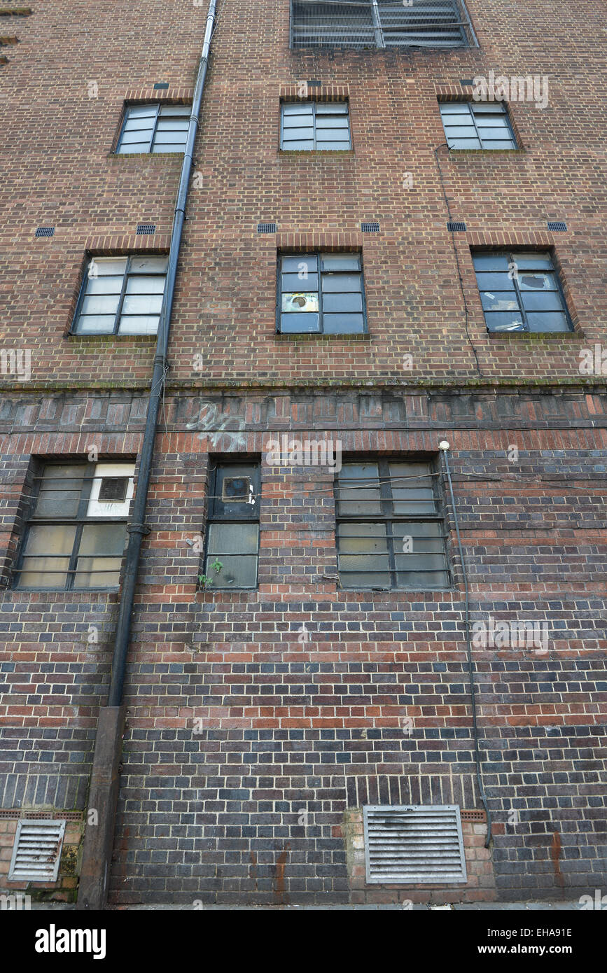 Brick wall windows Stock Photo - Alamy