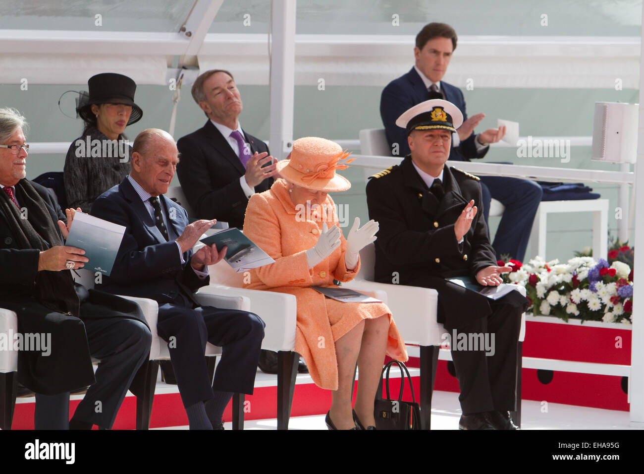 Her Majesty The Queen claps during the naming ceremony of the Britannia ...