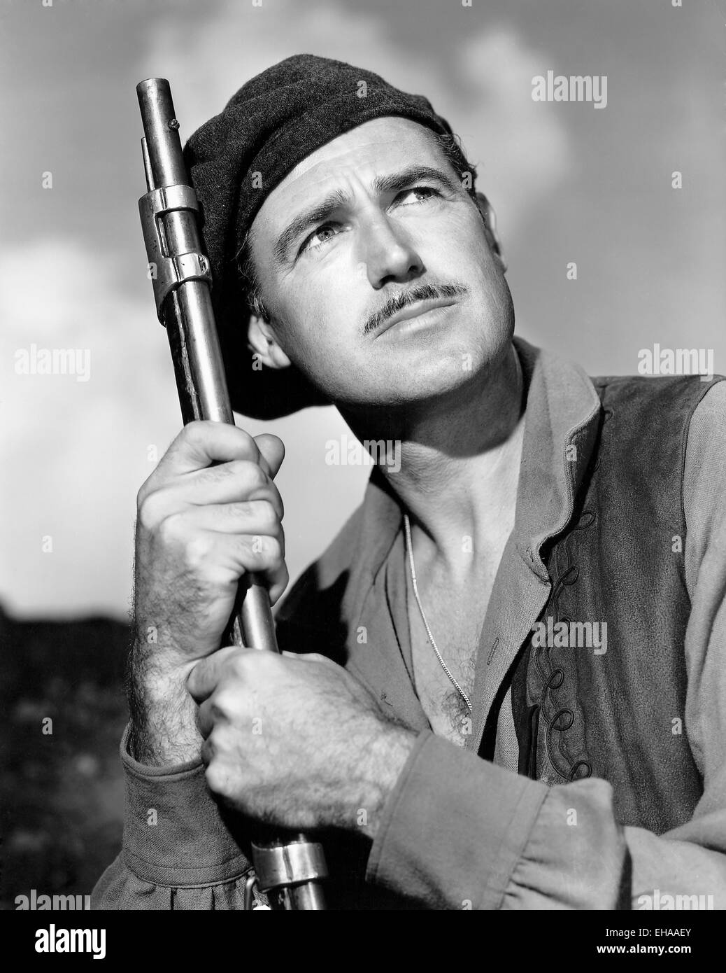 Patric Knowles, on-set of the Film "Quebec", 1951 Stock Photo - Alamy