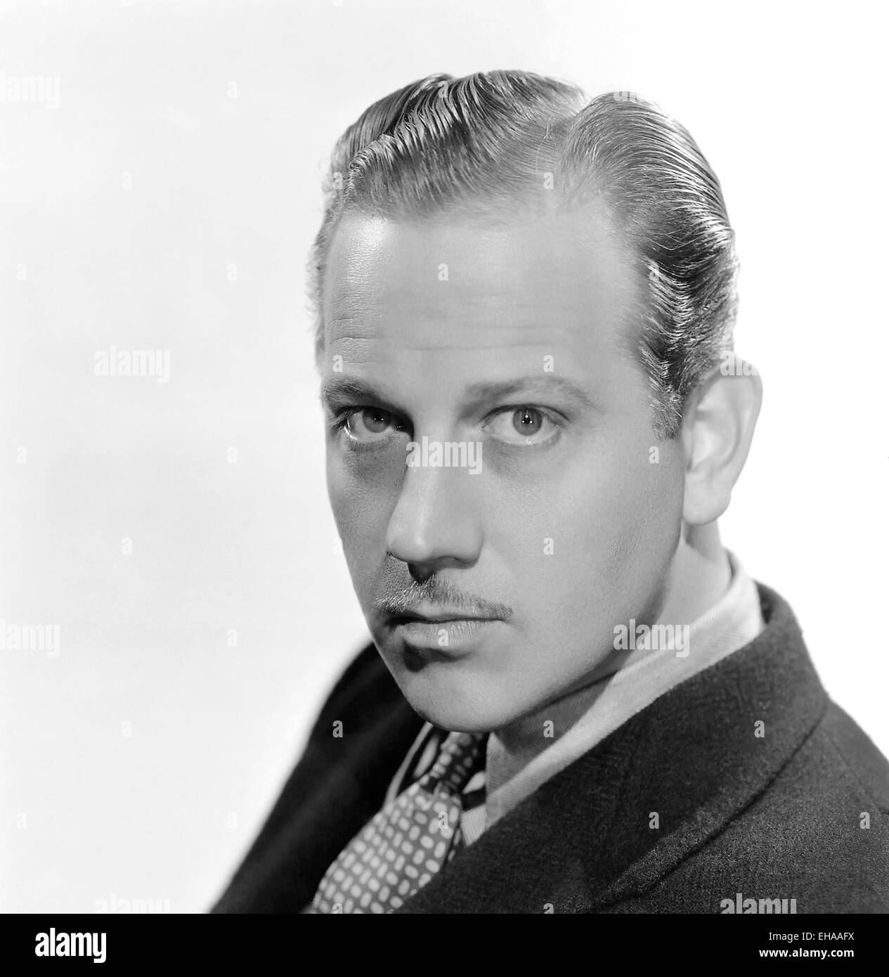 Melvyn Douglas, on-set of the Film "The Shining Hour", 1938 Stock Photo ...