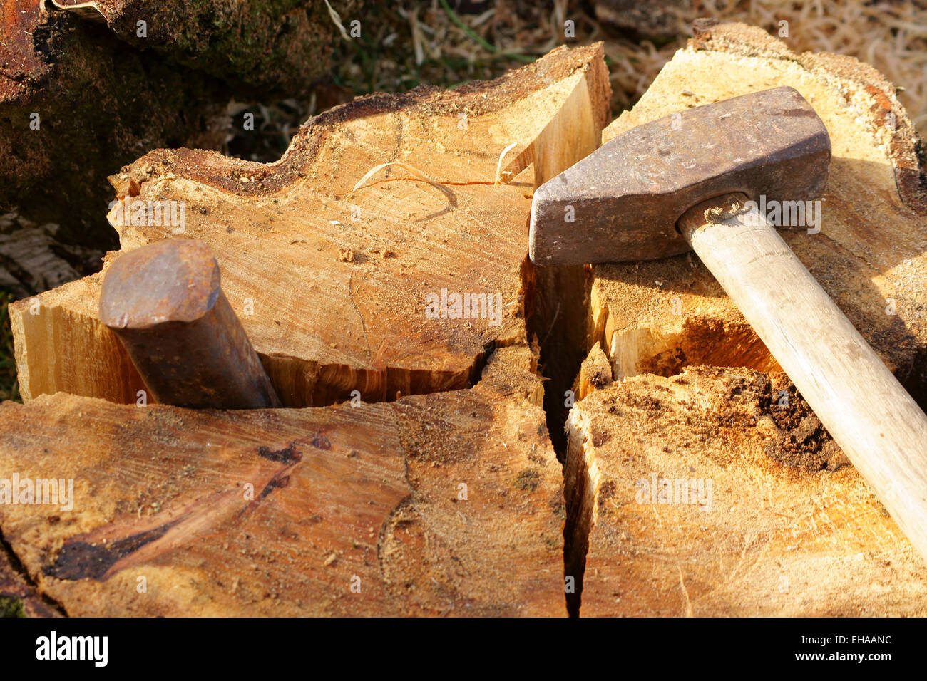 Wood wedge and hammer Stock Photo - Alamy