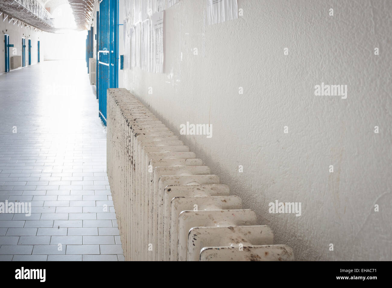 Radiator in an old prison. Metaphor of Heat in a cool place Stock Photo ...