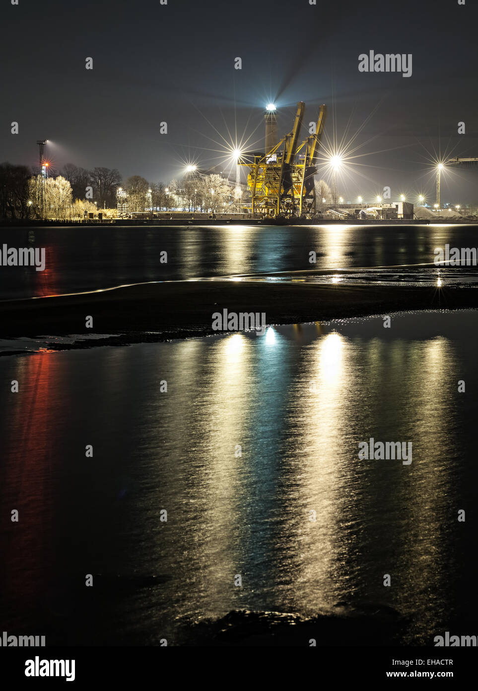 Night view of a port, industrial background Stock Photo - Alamy