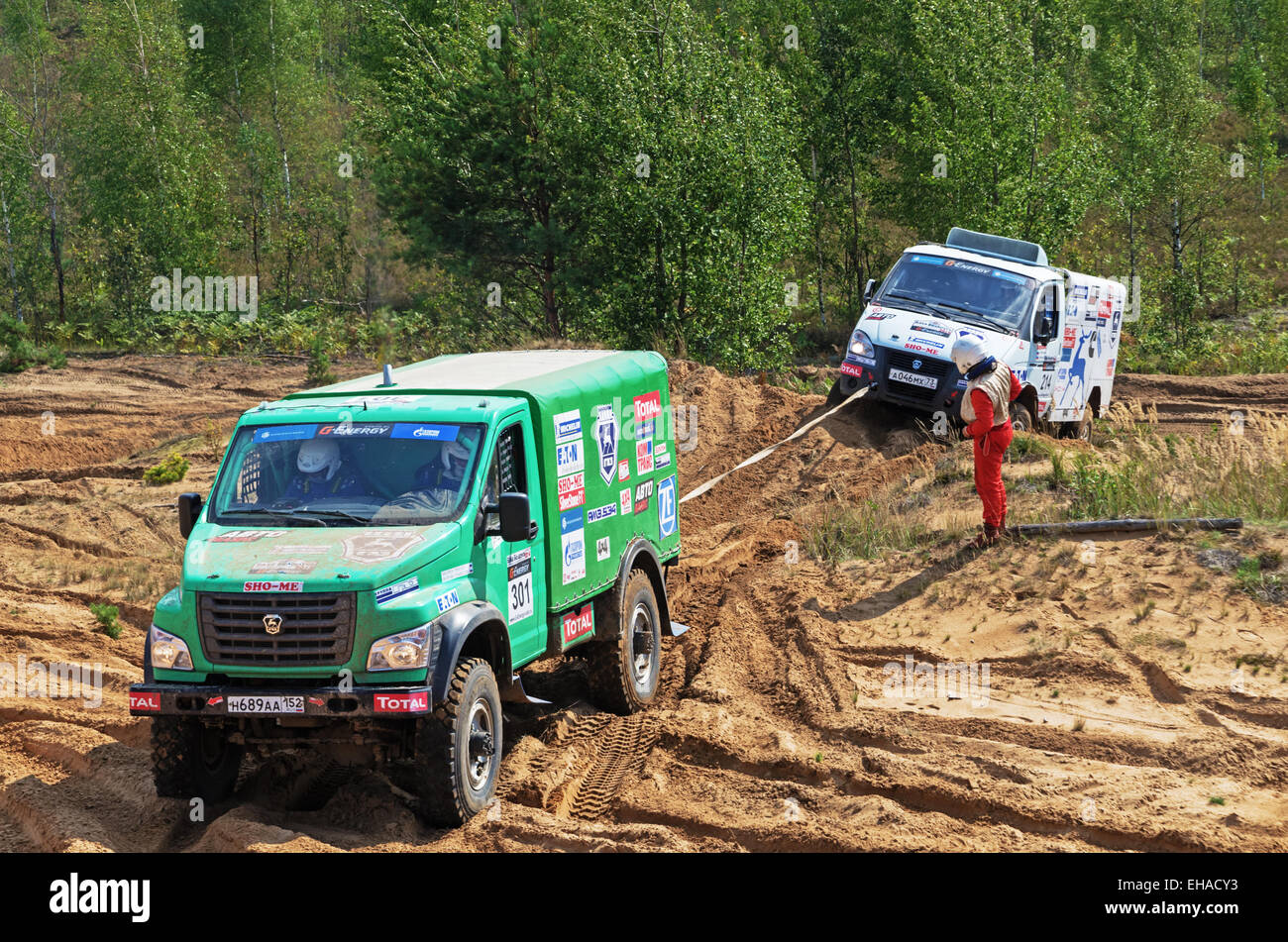 Races on a rally-raid on sandy dunes. Rally-raid Baha "Belarus" 2014 ...