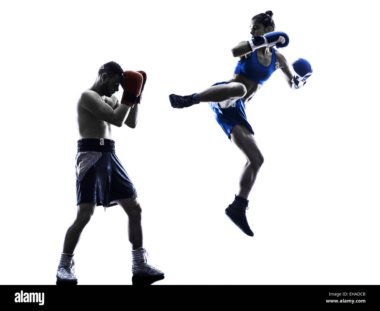 One Woman Boxer Boxing One Man Kickboxing In Silhouette Isolated On