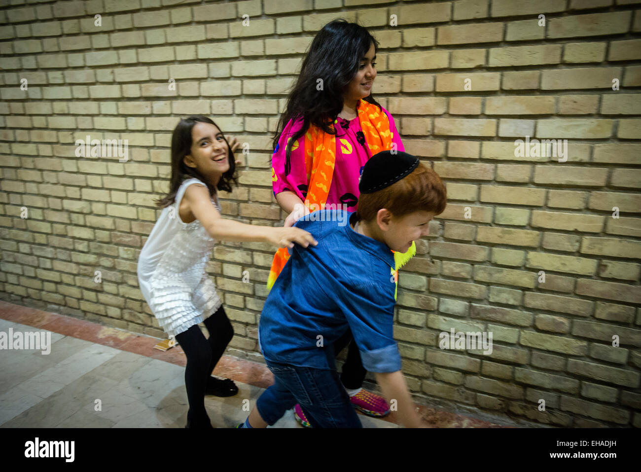 Kids play in Yusef Abad Synagogue, one of the biggest in Northern ...