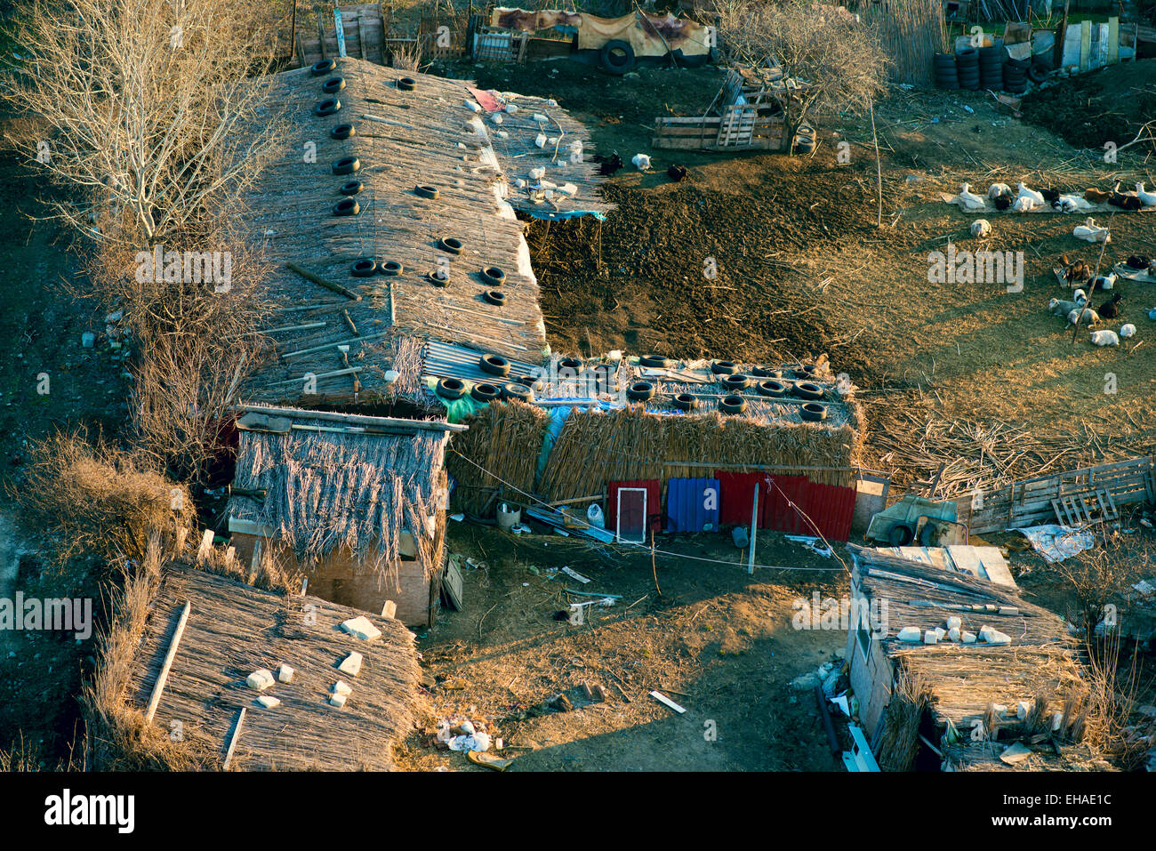 Poor houses near the city Stock Photo - Alamy