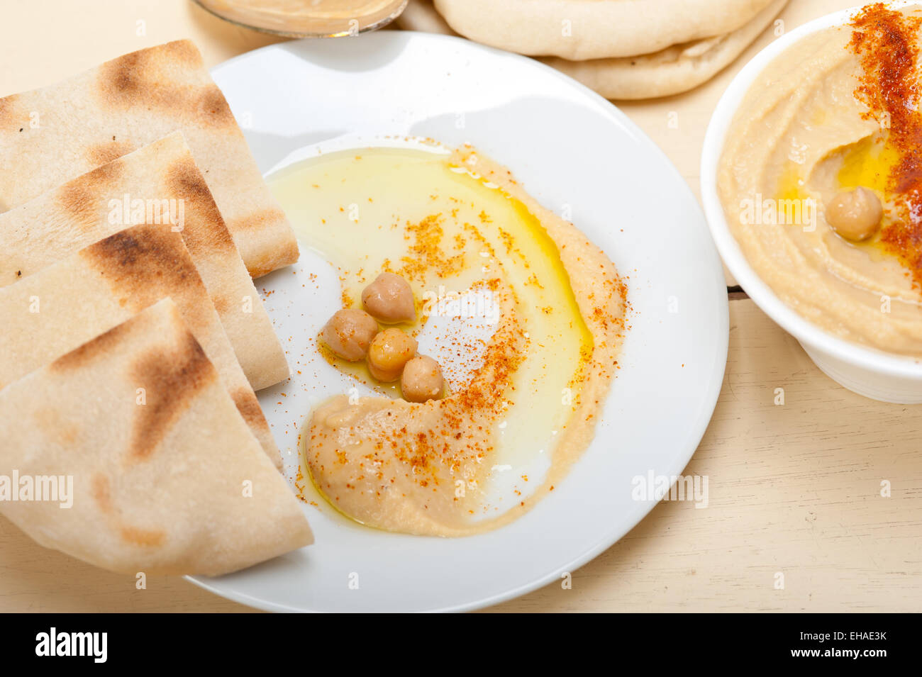 traditional chickpeas Hummus with pita bread and paprika on top Stock ...