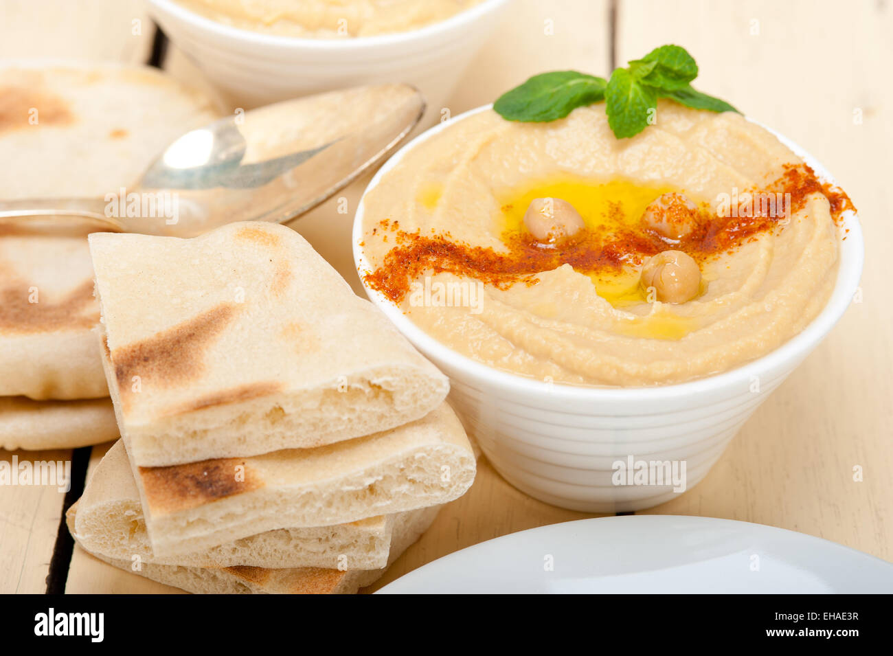 traditional chickpeas Hummus with pita bread and paprika on top Stock ...