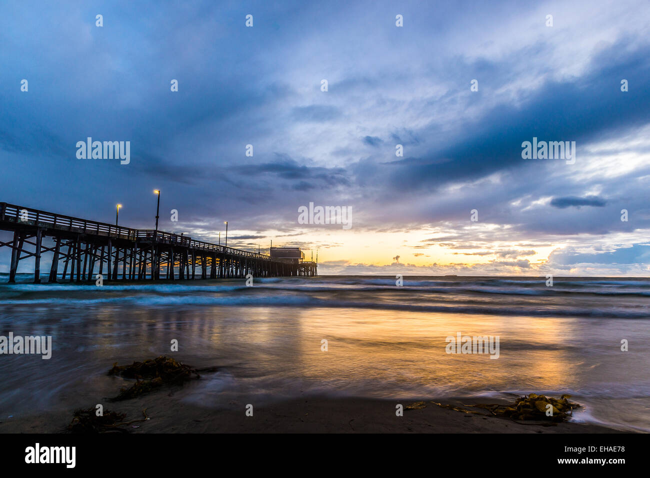 Beautiful side view of the pier during sunset Stock Photo - Alamy